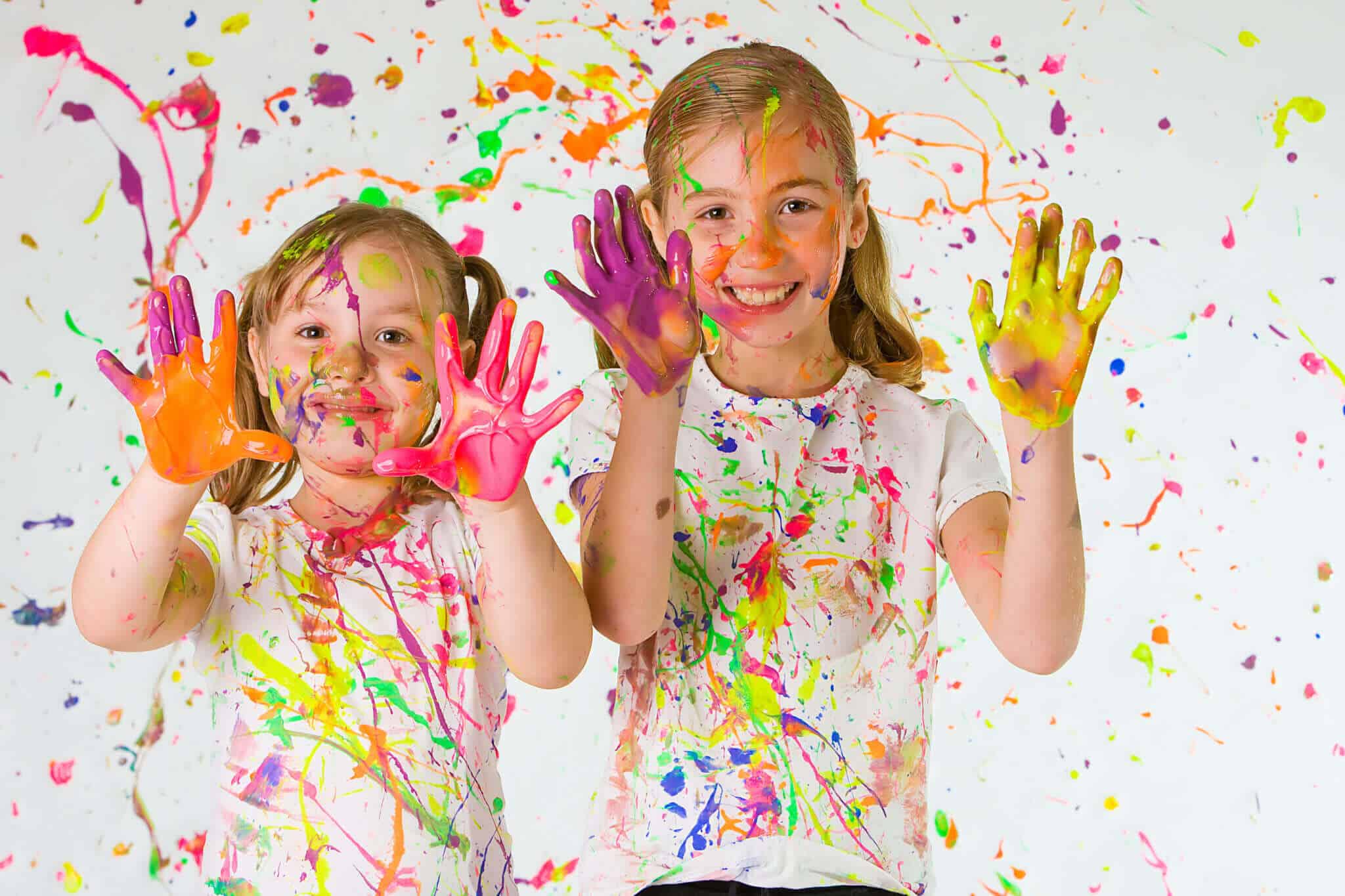 Children with a messy painting project - iCare Childcare Management ...